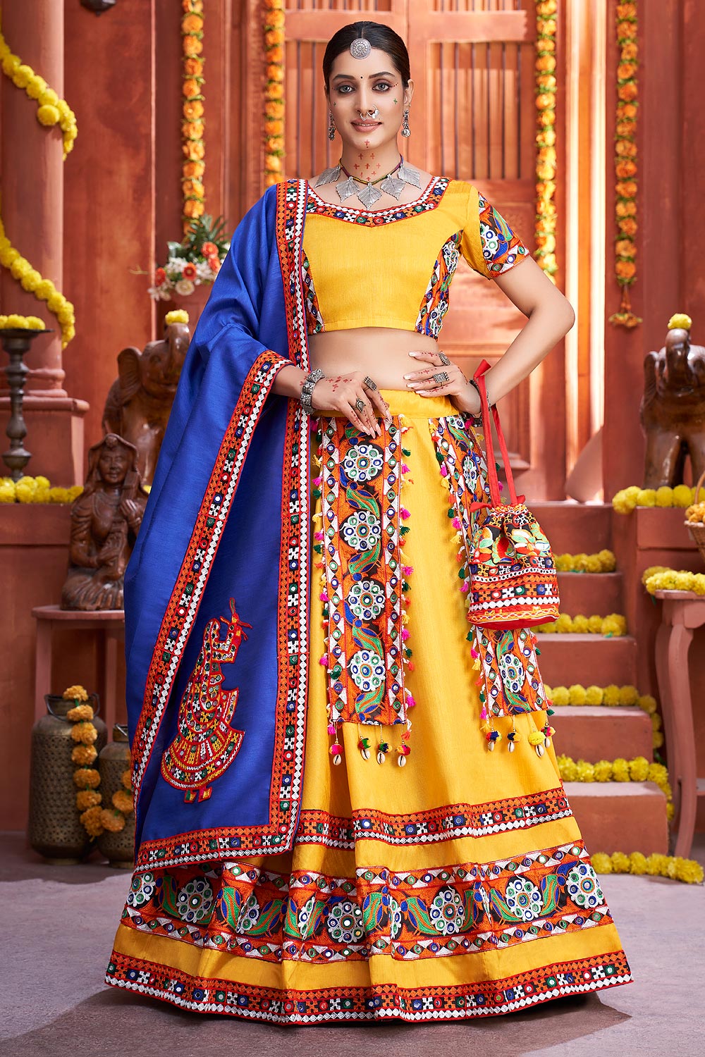 Buy Yellow & Royal Blue Embellished Silk Lehenga Set With Potli Bag For ...